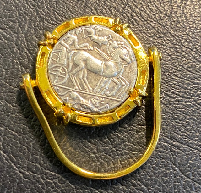 Flip over ring Caesar and chariot ring as dress or casual wear