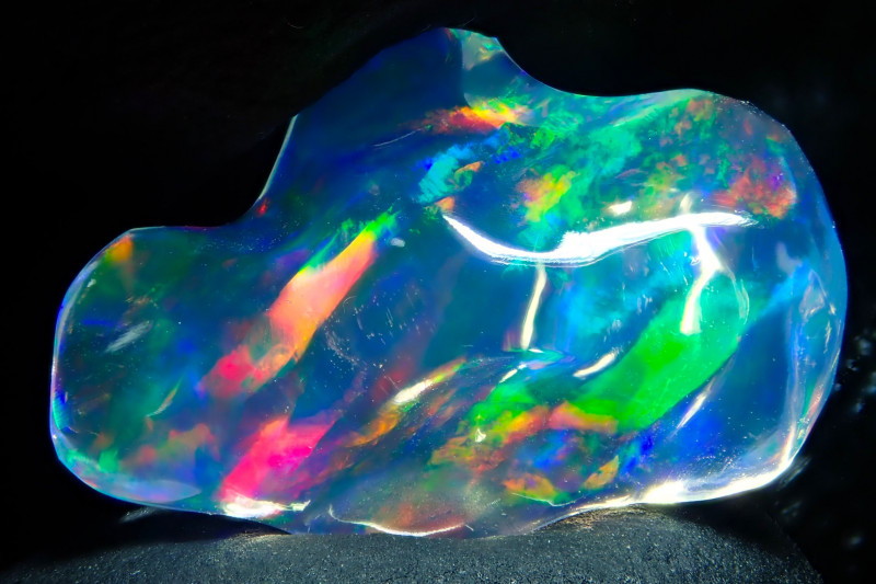 2.95ct Water Opal With Play Of Colour Bright Carved