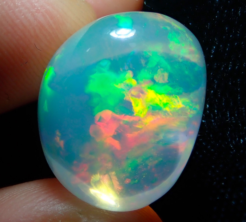 11.26ct Water Opal With Play Of Colour Bright Carved